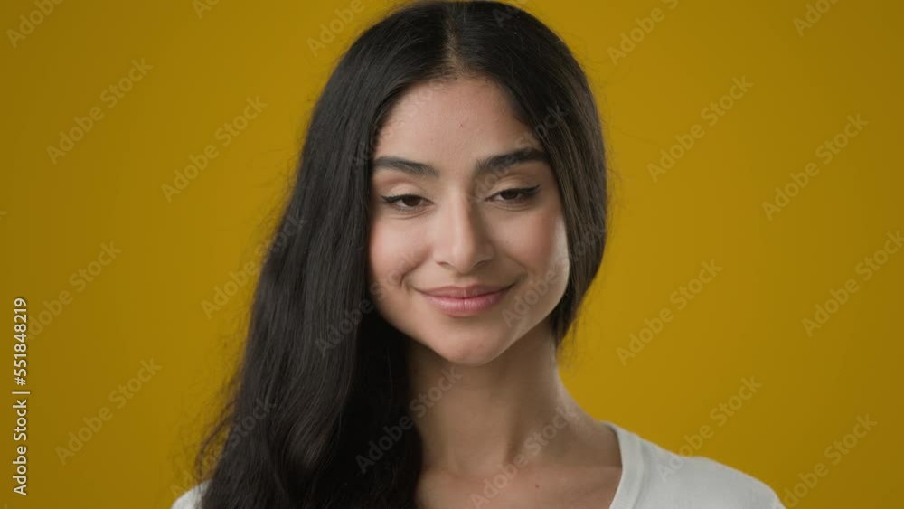 Close up front view head shot close up portrait in yellow studio ...