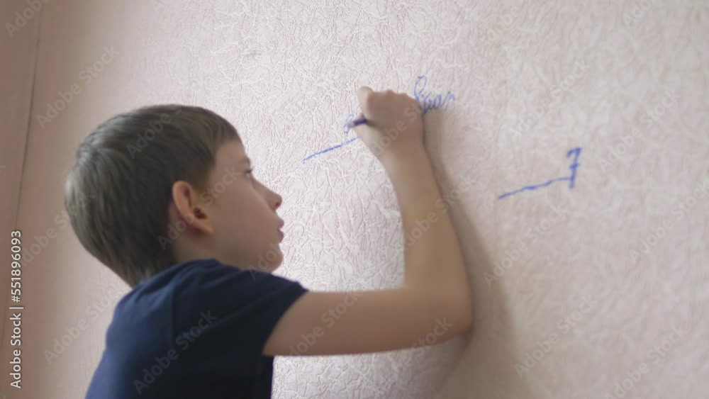 children grow and mature, the boy measured his height and draws a new ...