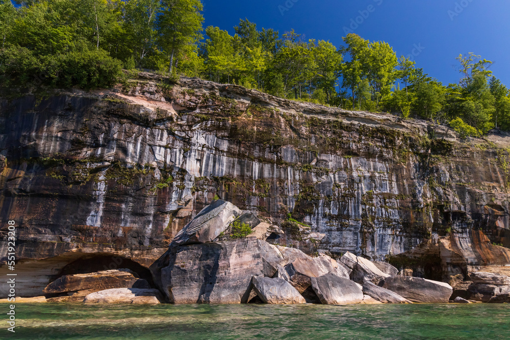 Natural arches and sea caves along Lake Superior at Pictured Rocks ...