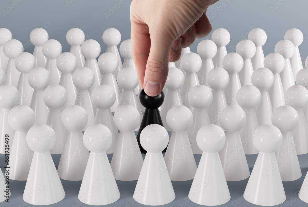 White pawns and one black pawn. Diversity, racism and discrimination ...