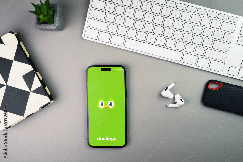 Duolingo language-learning app on the smartphone screen on grey ...
