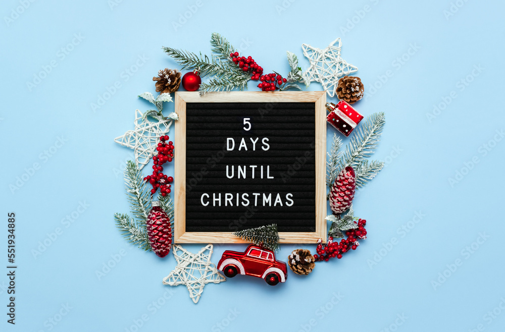 Felt letterboard with letters with countdown surrounded by winter ...