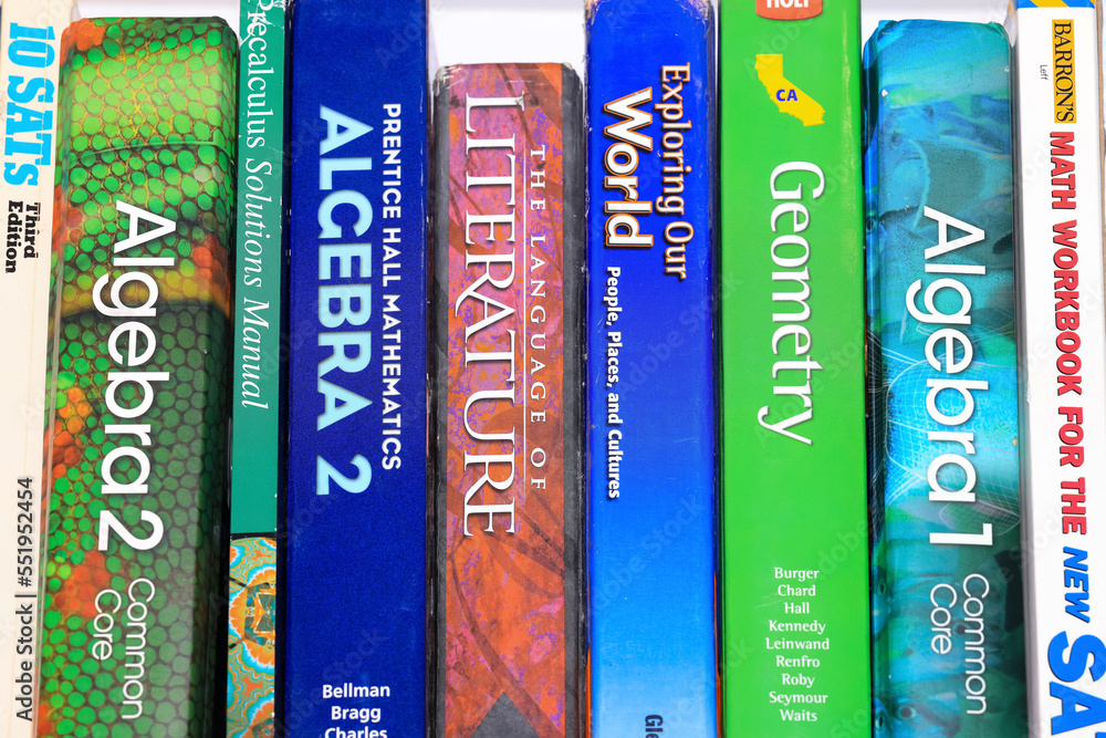 Row of different high school text books books , uses in the class room ...