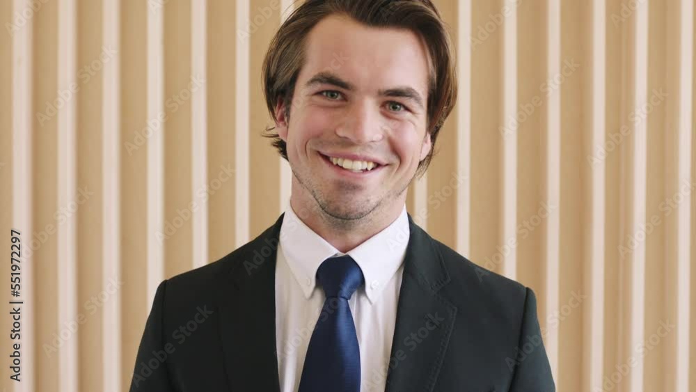 Success, smile and face of businessman with wall background for ...