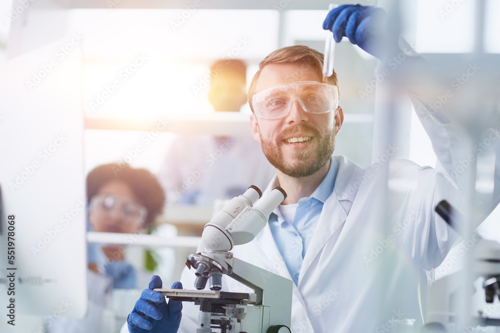 In a Modern Laboratory Research Scientist Conducts Experiments Stock ...