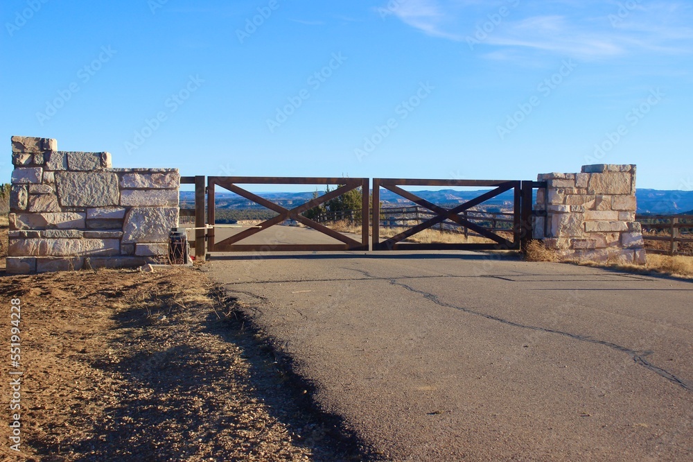Gate to gated community living space. Beautiful house development in ...