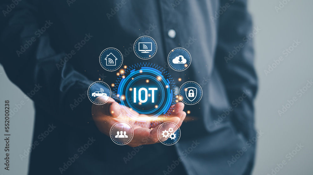 businessman showing IOT virtual screen interface. Internet of Things or ...