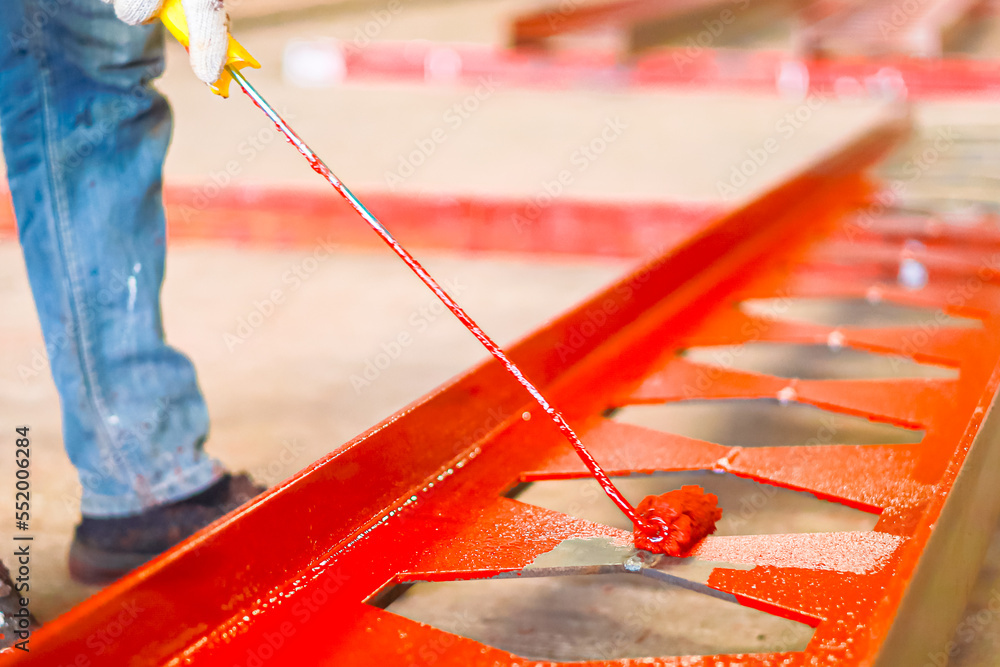 Painter is painting a steel beam of steel structure Stock Photo | Adobe ...