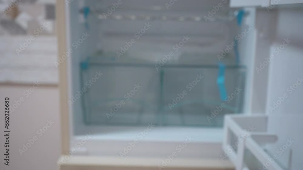 Opens the new refrigerator is empty,the kitchen door opens in the ...
