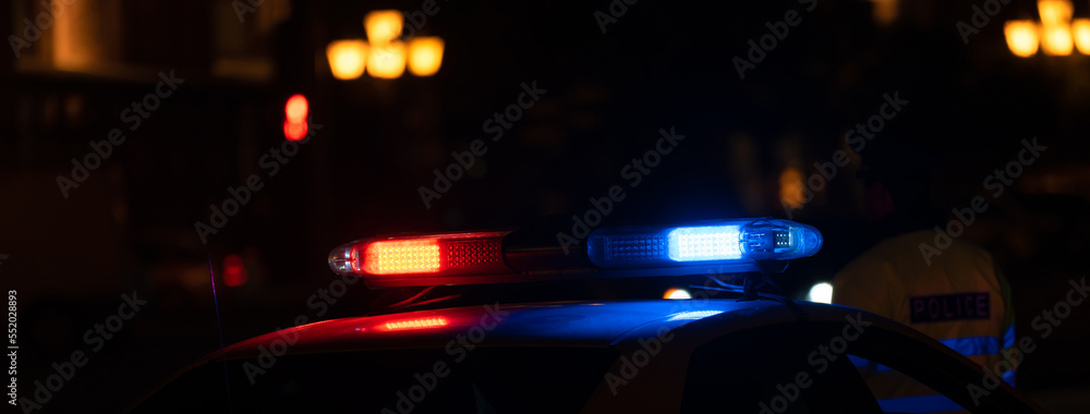 Police car with flashing lights on Stock Photo | Adobe Stock