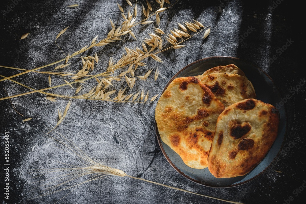 Dark background on the table. Exotic cuisine still life- indian food ...