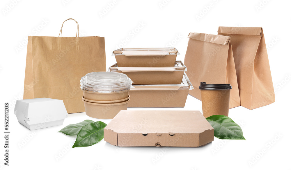 Different containers, coffee cup and green fresh leaves on white ...
