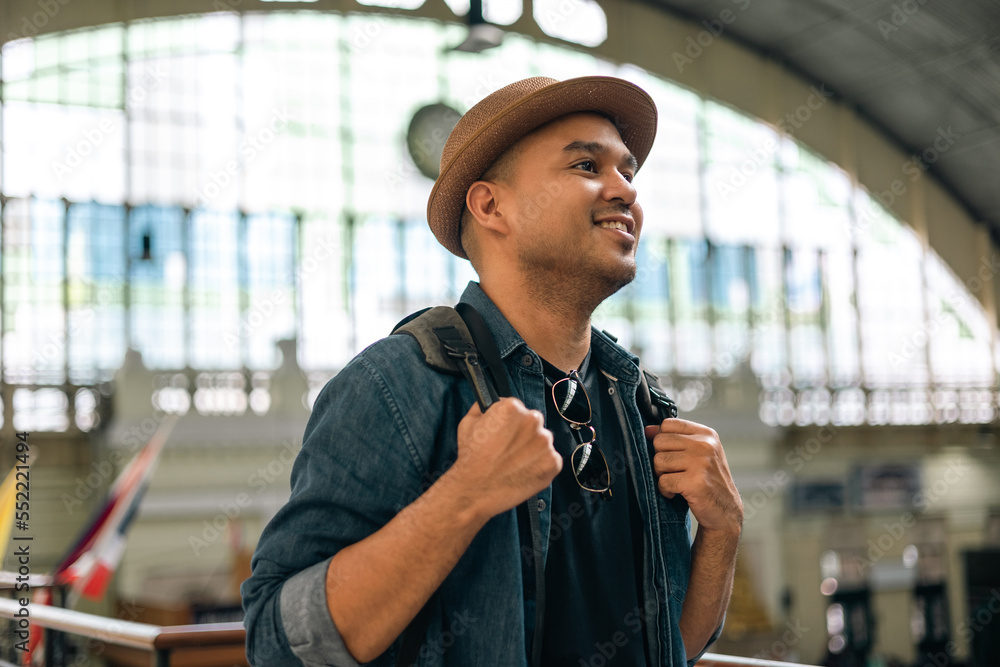 Freedom traveler young asian man at terminal train station. Happy ...