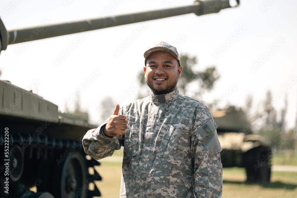 Asian man special forces soldier standing against on the field Mission ...