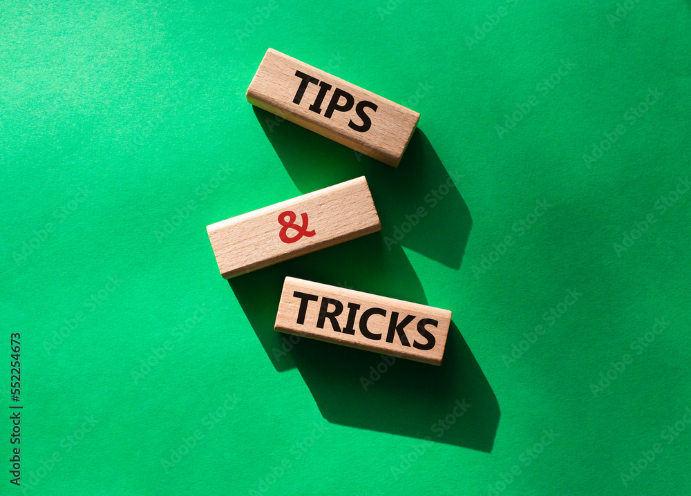 Tips and tricks symbol. Wooden blocks with words Tips and tricks ...