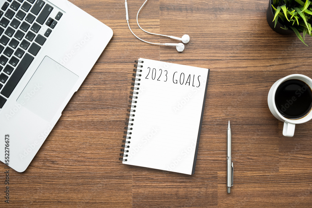 Notebook with 2023 goals text on it to apply new year resolutions and ...