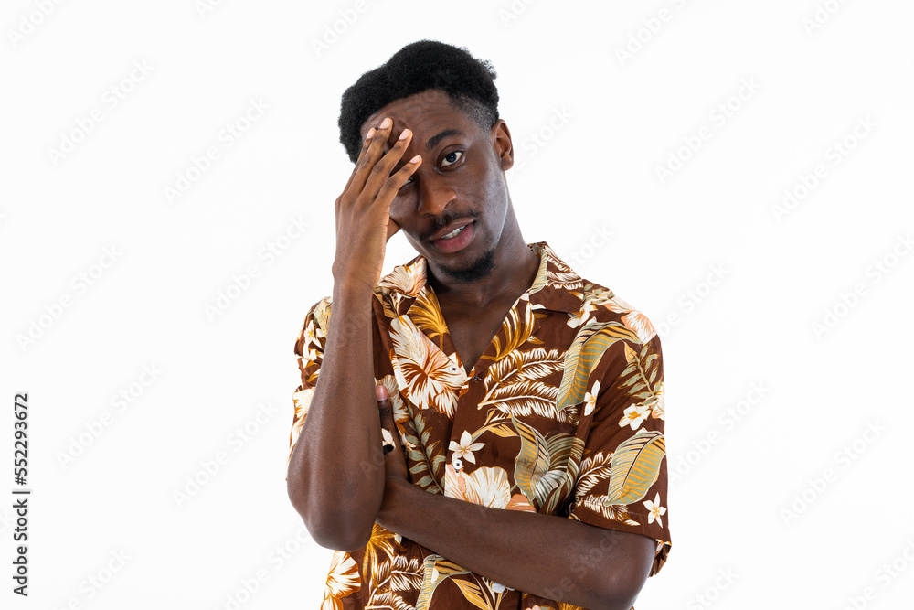 Curious delighted handsome man holding arms near face looking at camera ...