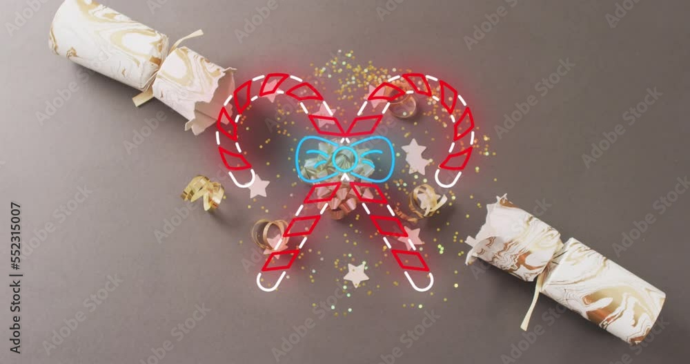 Animation of candy canes over christmas decorations and cracker Stock ...