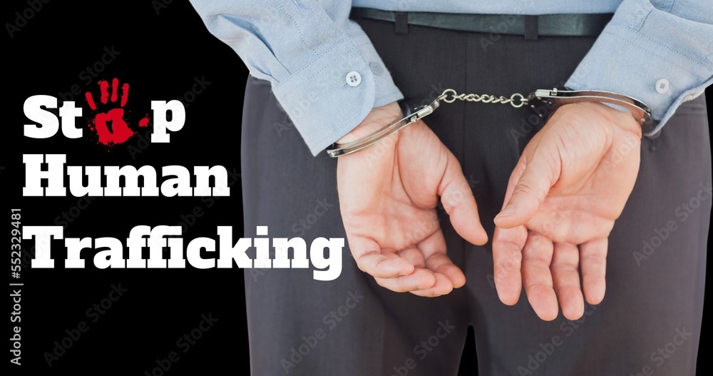 Composite of midsection of caucasian businessman with handcuffs and ...