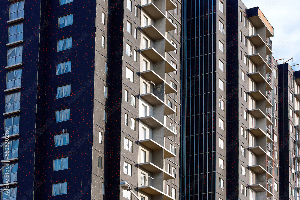 Residential building with thermal insulation panel, black mineral wool ...