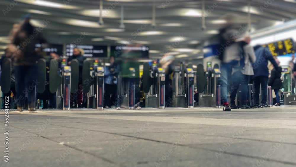 Train station ticket line time lapse. Passengers moving though the ...