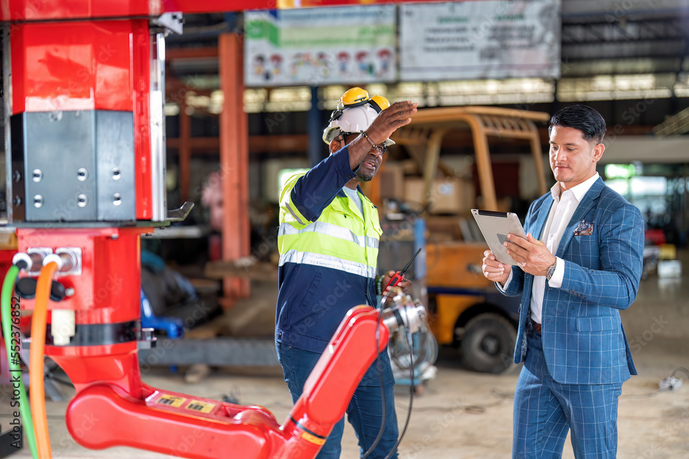 Engineer customer service explain introduction of new design robotic ...