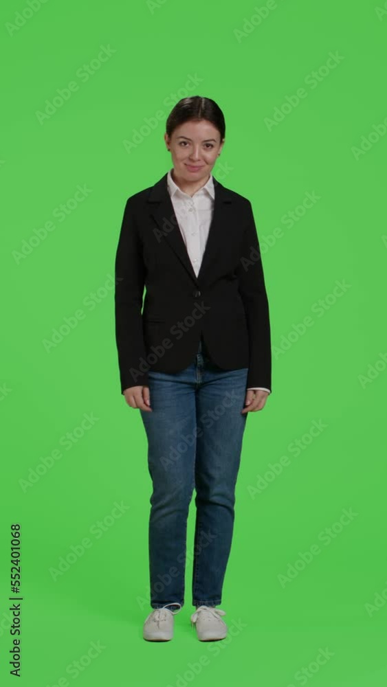 Vertical video: Front view of young businesswoman acting confident ...