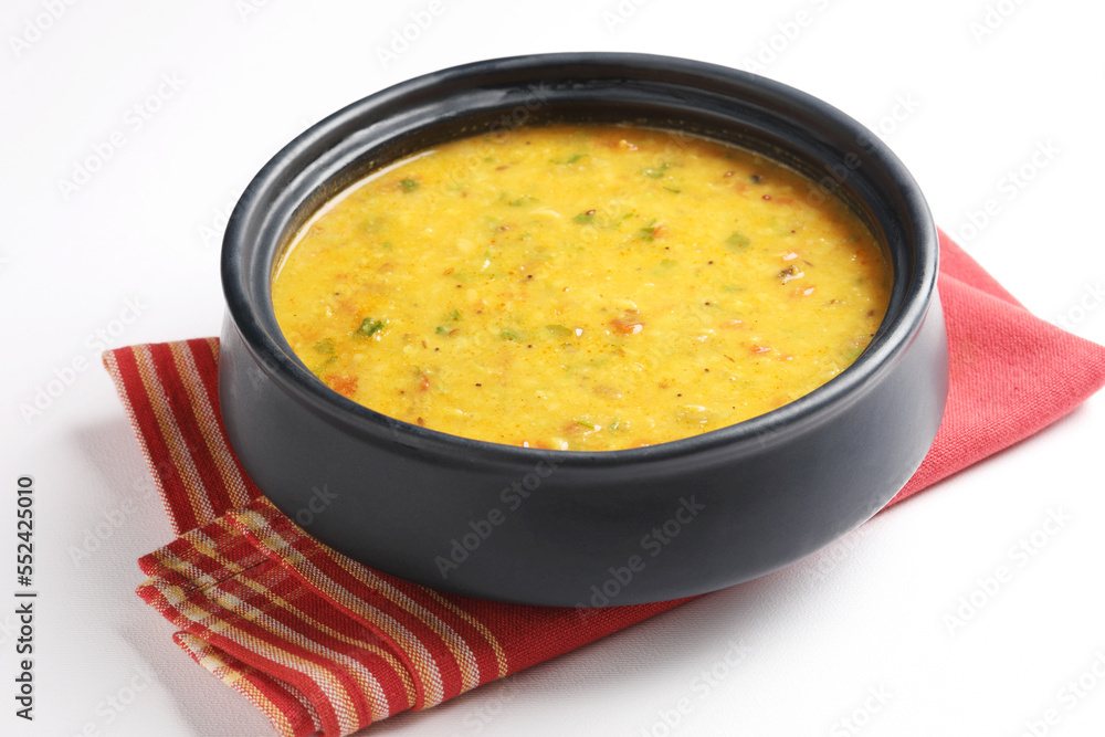 Dal tadka is a popular Indian dish where cooked spiced lentils are ...