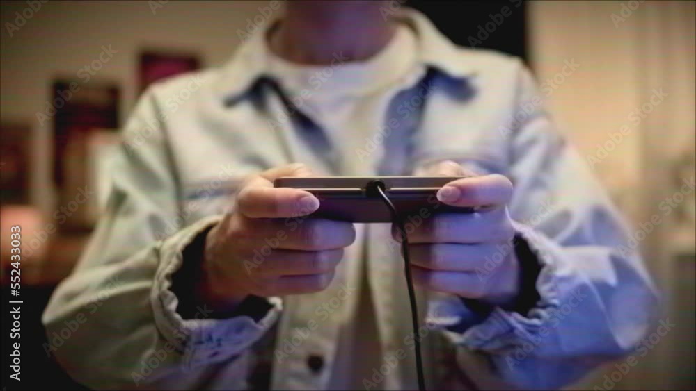 Man playing a game on retro style console, enjoying and play vintage ...