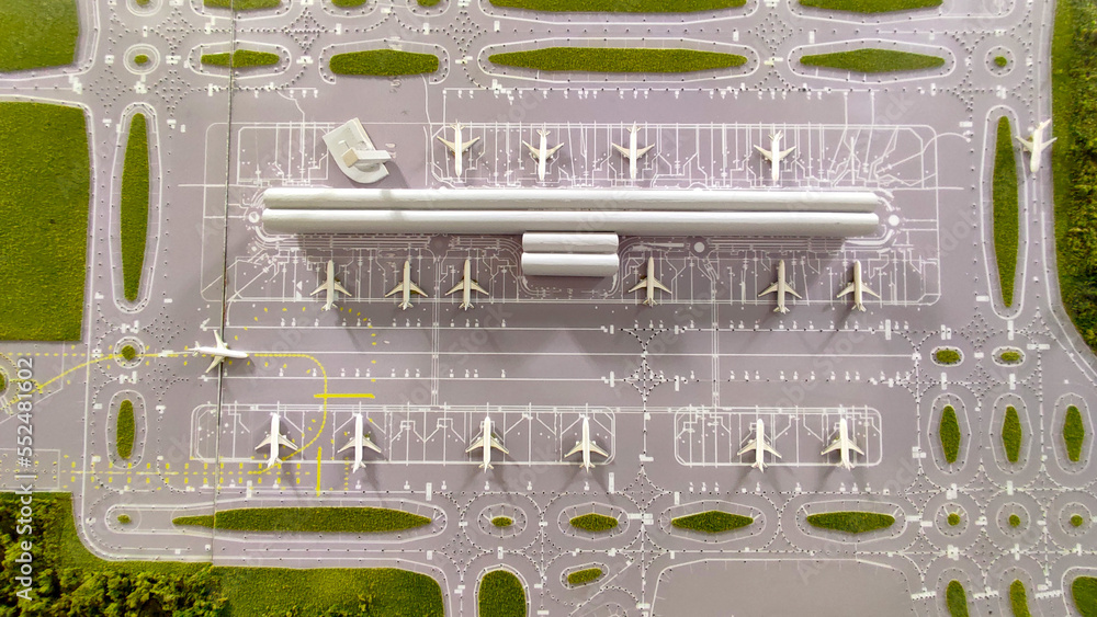 Realistic scale model of an airport runway view from above, with planes ...