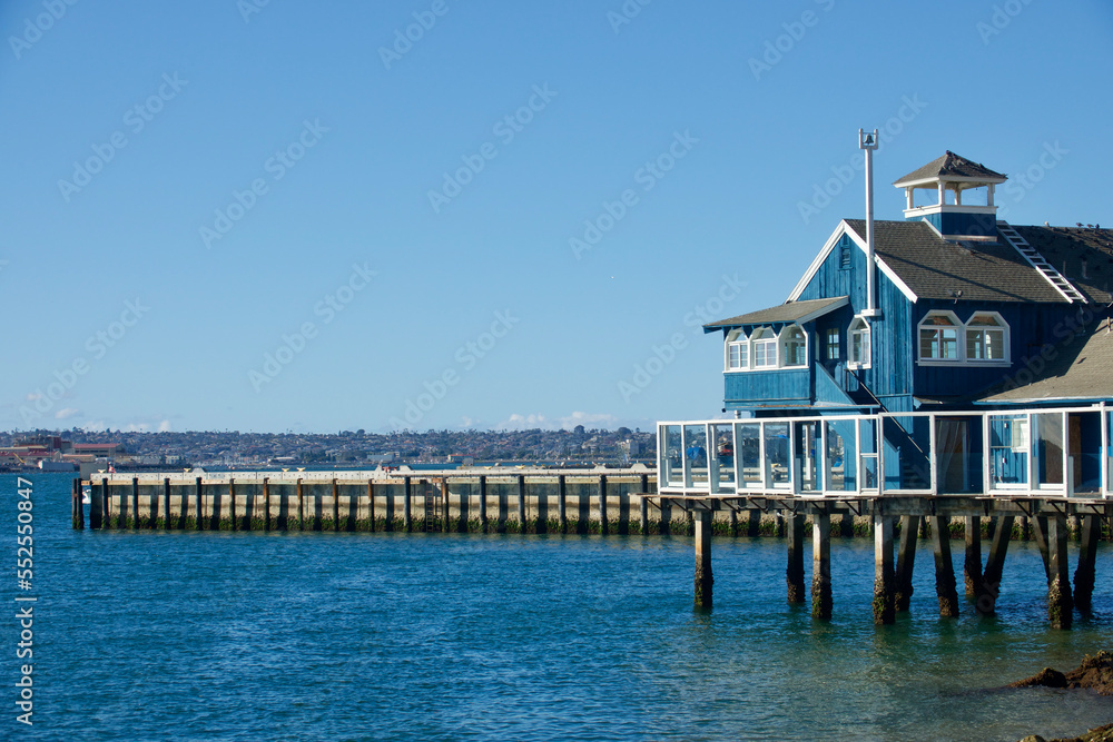 vintage waterfront building built on pylons in the harbor Stock Photo ...