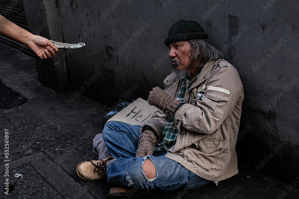Fotografia do Stock: Asian homeless man feel bored and do not want ...