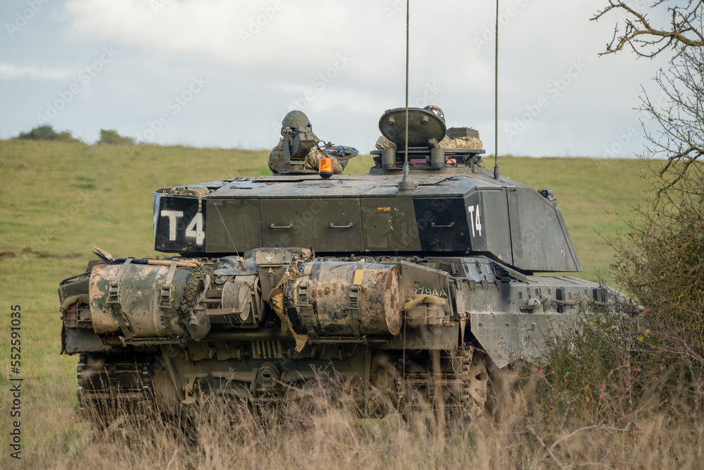 detailed close up of a commander and gunner directing action in a ...