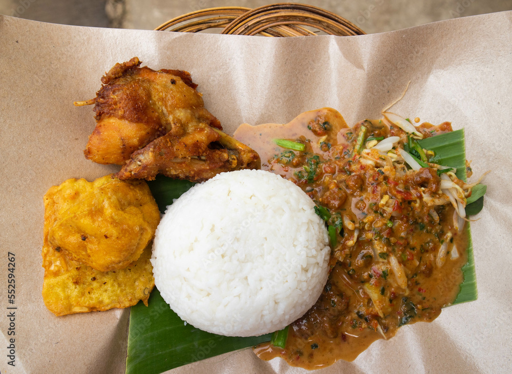 Nasi Pecel. Traditional Javanese rice dish of steamed rice with ...