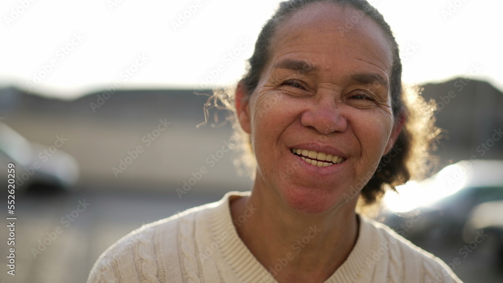 Joyful hispanic older woman portrait face smiling and laughing. Happy ...