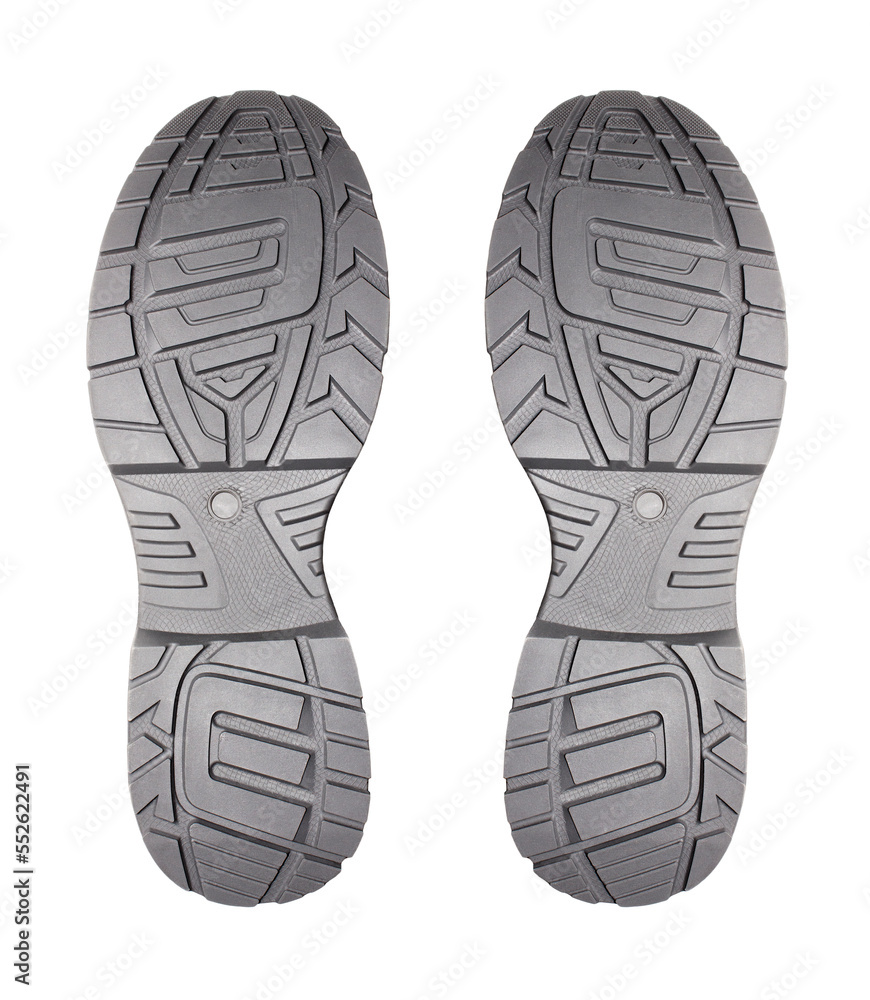 Rubber soles of military boots with tread on a white background.Studded ...