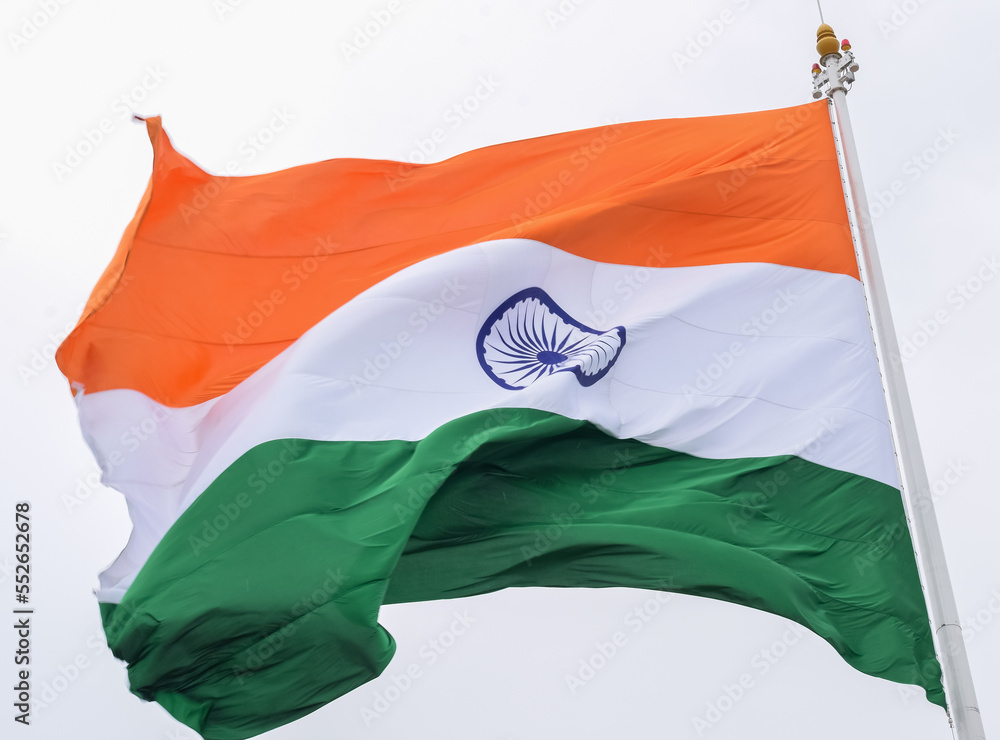 India flag flying high at Connaught Place with pride in blue sky, India ...