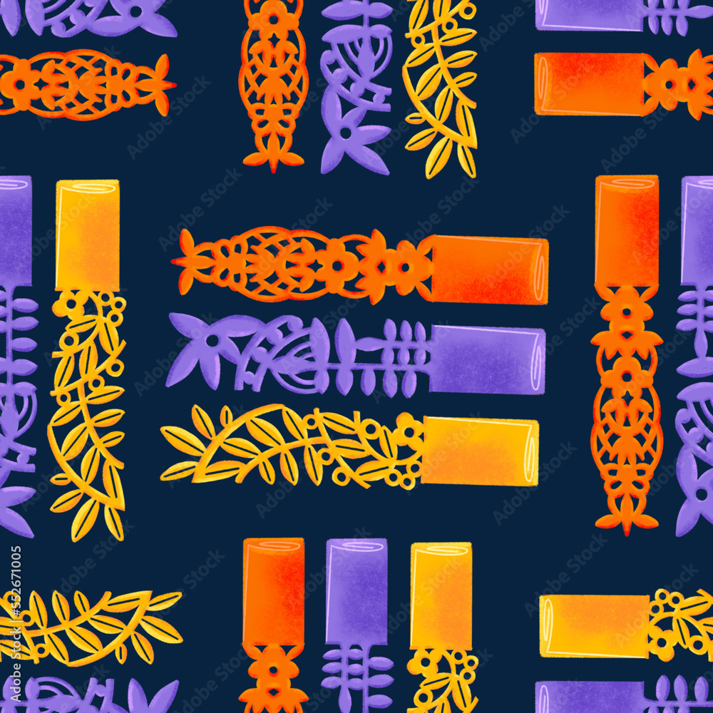Filipino pastillas candy with handcut paper wrapper in orange, purple, and yellow on dark blue ...