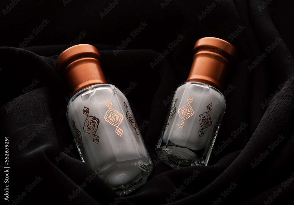 arabian oud oil made of agar wood ,closeup,cinematic realism light ...