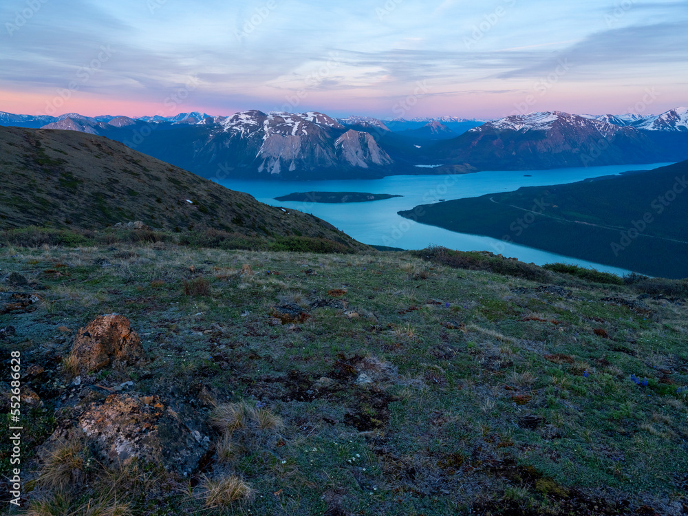 Bove Island can be seen in the centre of Tagish Lake, Yukon. Midnight ...
