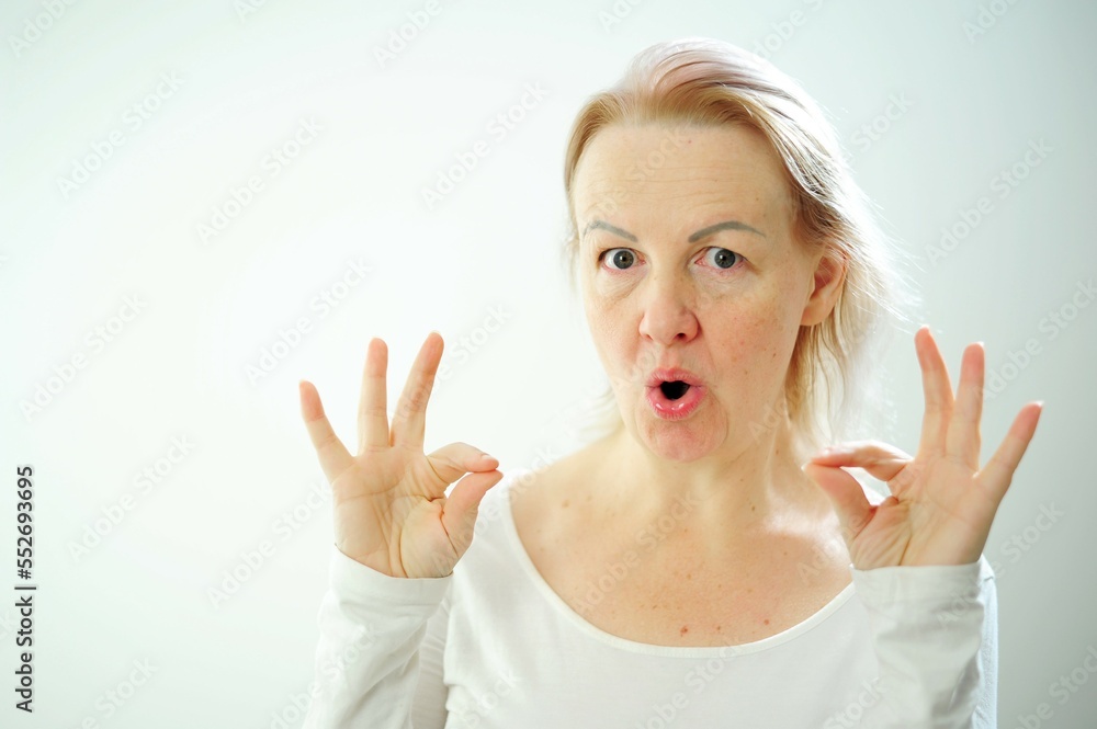 Closeup image of a woman making and showing ok hand sign Pin-up retro ...