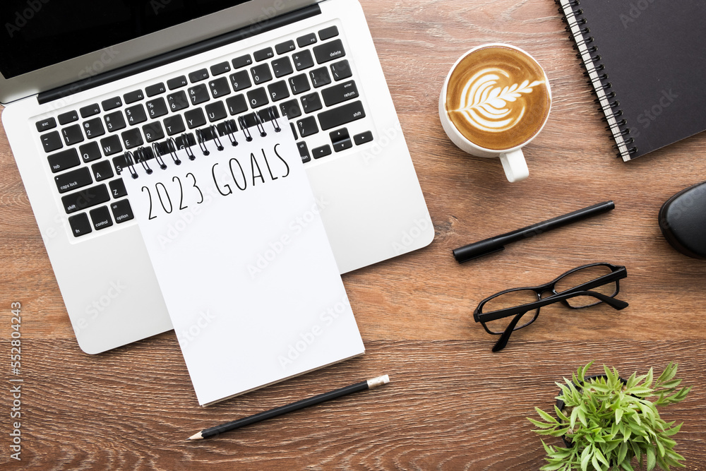 Notebook with 2023 goals text on it to apply new year resolutions and ...