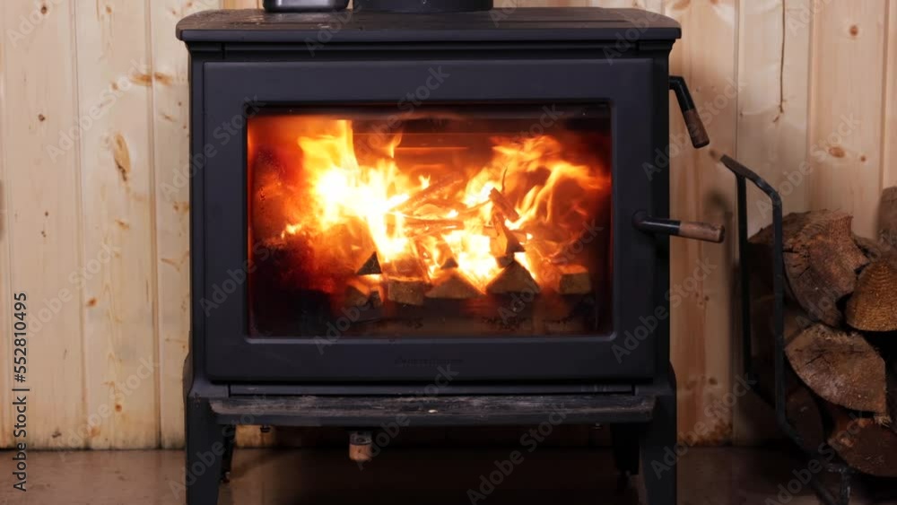 Fireplace stove. Flames in the country house. Fire is burning in the ...