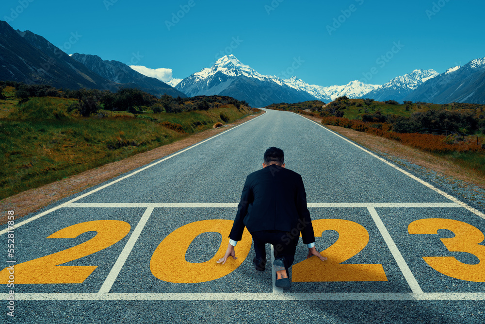 The 2023 New Year journey and future vision concept . Businessman ...