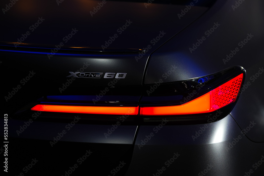 The logo sign of the new electrical luxury limousine BMW i7 car placed ...