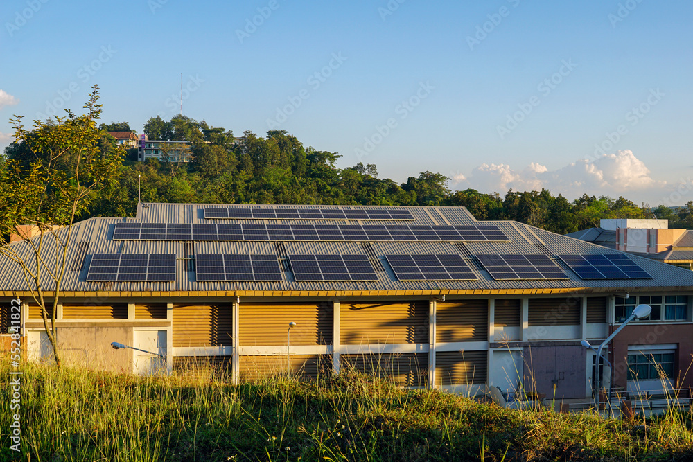 A solar roof system in a building that installs solar panels on the ...