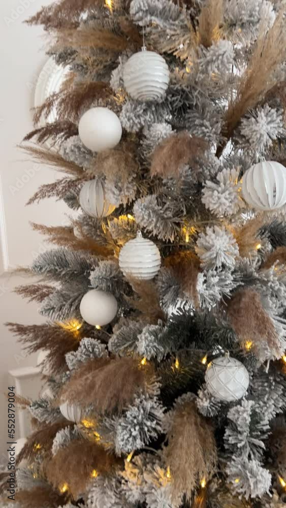 Christmas Tree view from top to bottom. Hall room with a fireplace with ...