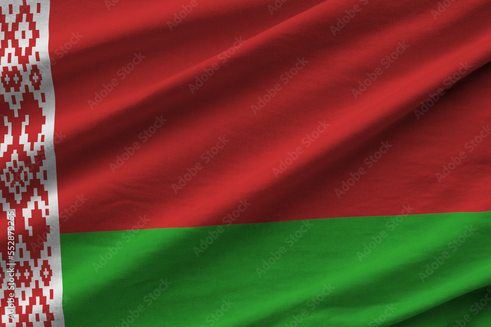 Belarus flag with big folds waving close up under the studio light ...