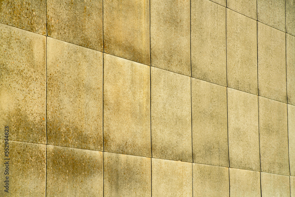 Row of cement square grids with vertival and horizontal grout lines on ...