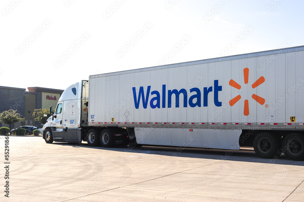 Walmart truck and trailer showing sign and logo on the parking lot of a ...